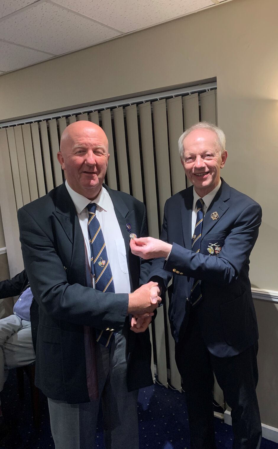 Nigel Chesters receiving his President Elect Badge of Office from ...